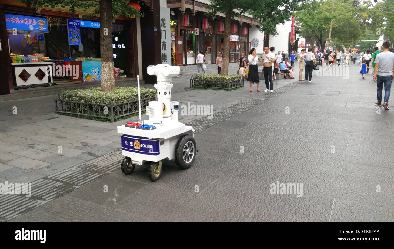 An unmanned patrol robot is patrolling on the street of the Confucius ...