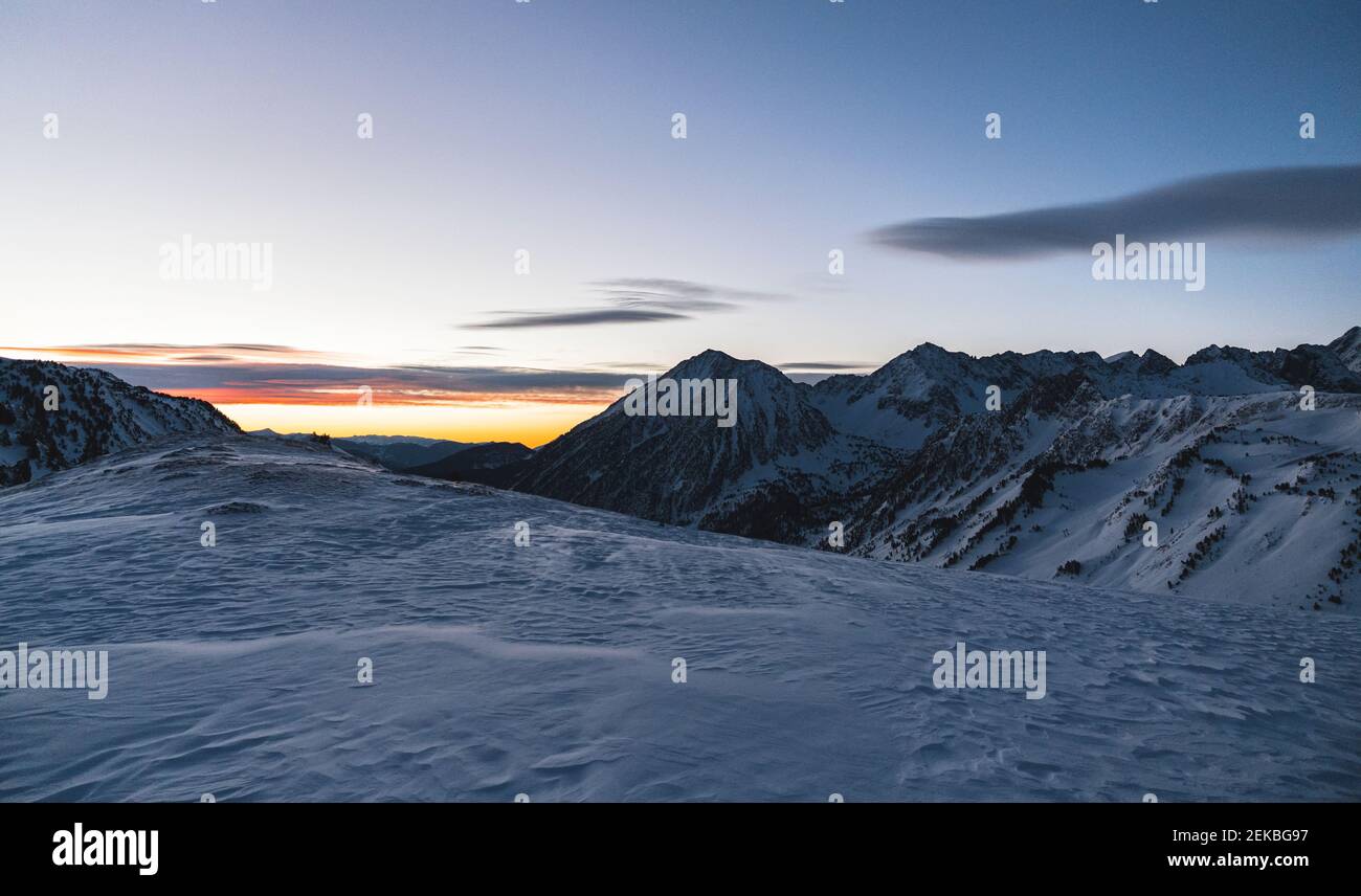 Snowy mountain during sunrise Stock Photo - Alamy