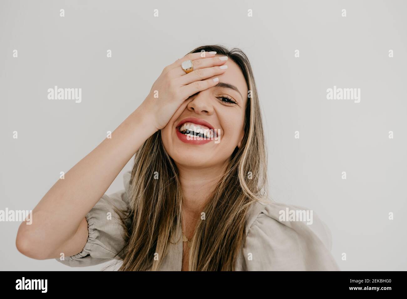 Hand covering eye hi-res stock photography and images - Alamy
