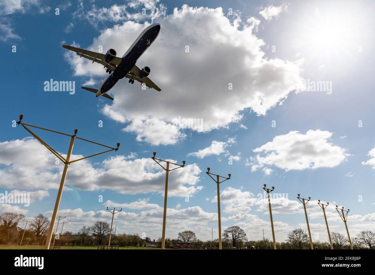 Commercial airplane preparing to land Stock Photo - Alamy