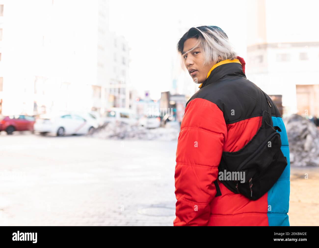 Man Walking Looking Over Shoulder Smiling Man Walking With Hand In