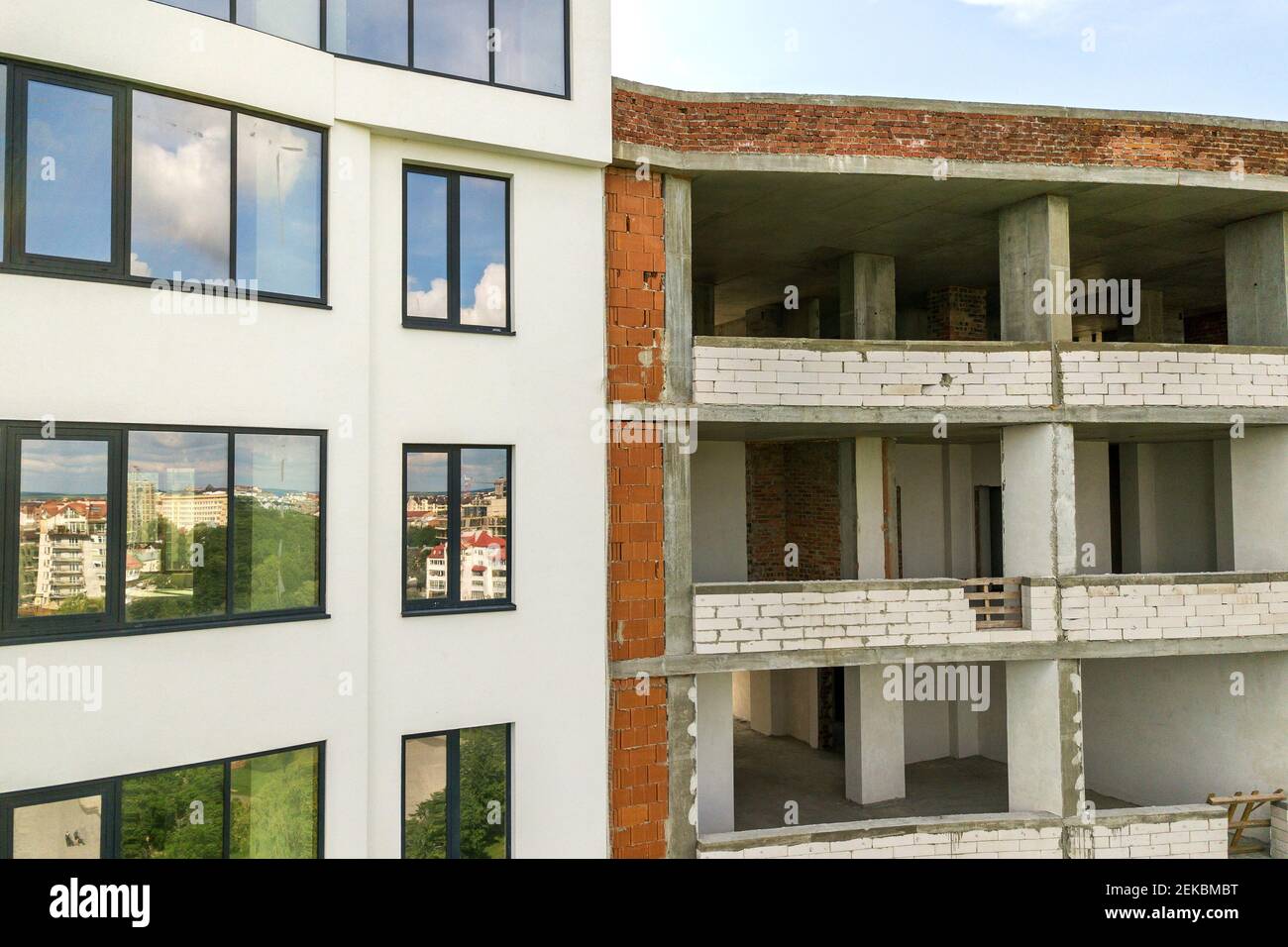 Many windows on new apartment building facade under construction Stock ...