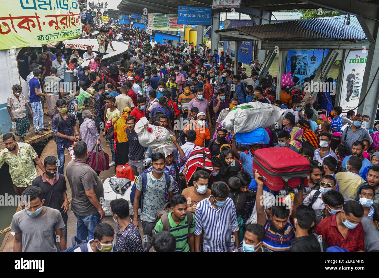 People crowded at Dhaka River Port leaving the capital for their home ...