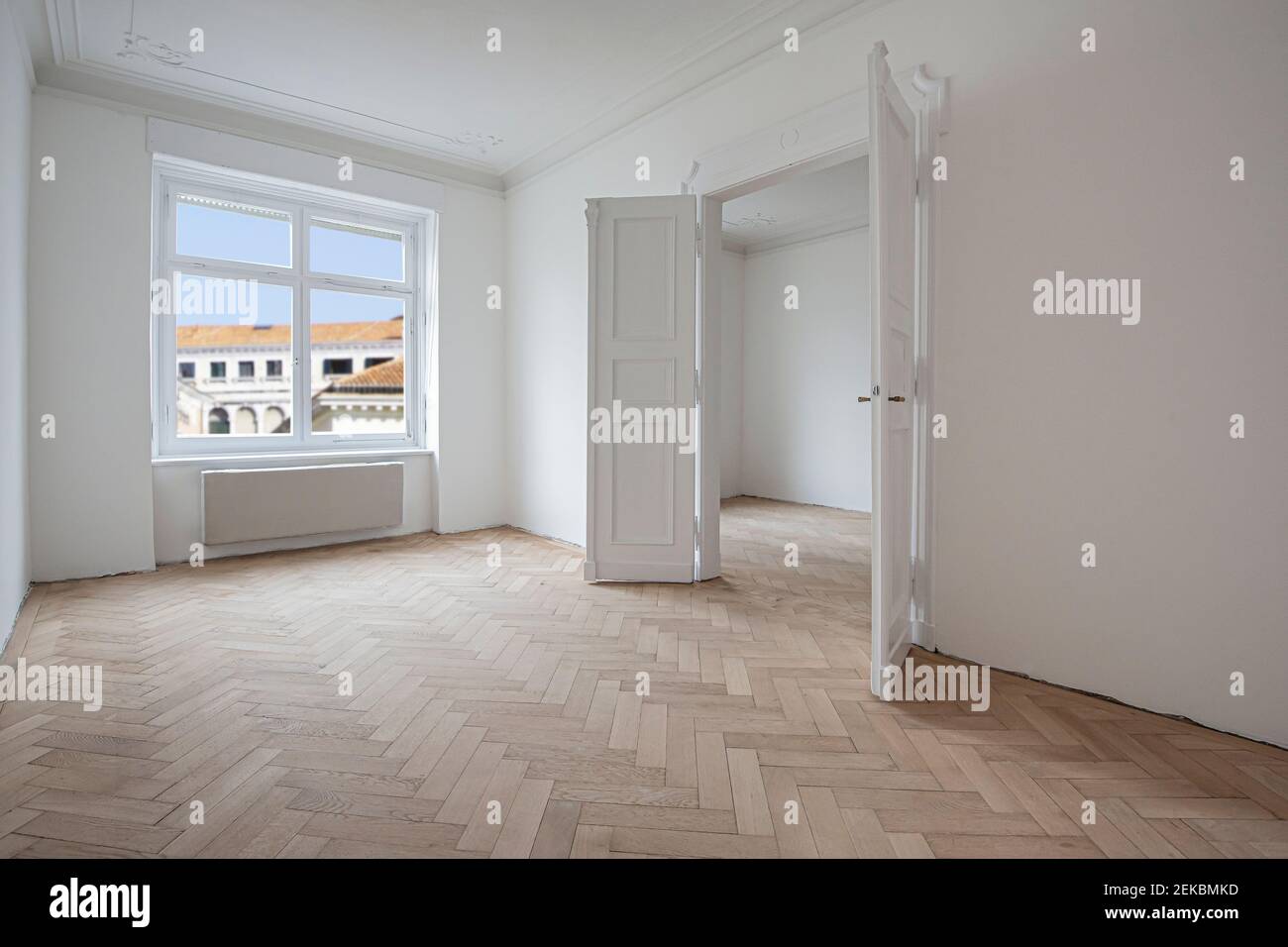 Open doors inside new renovated apartment Stock Photo - Alamy