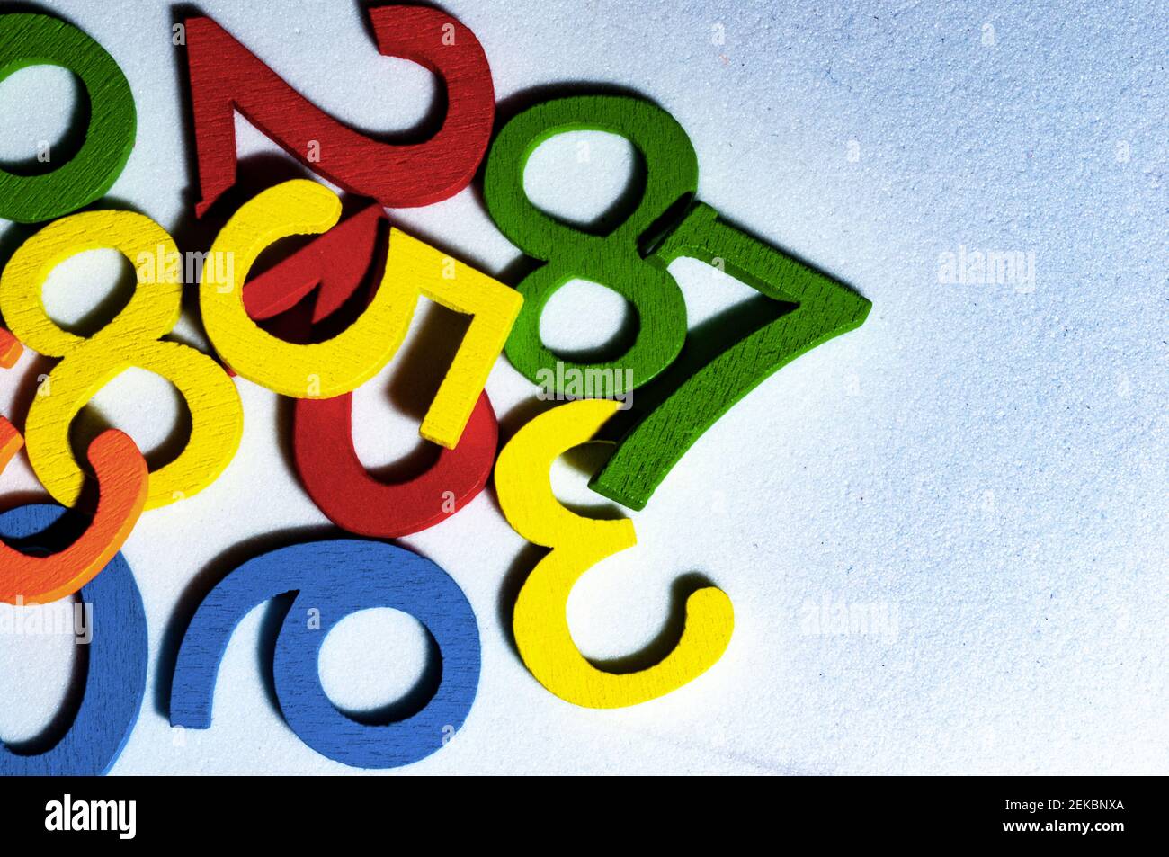Wooden numbers close-up view in white background Stock Photo - Alamy