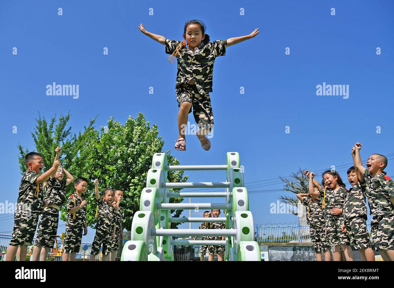 YANTAI, CHINA - JULY 31, 2020 - The children in kindergarten play the ...