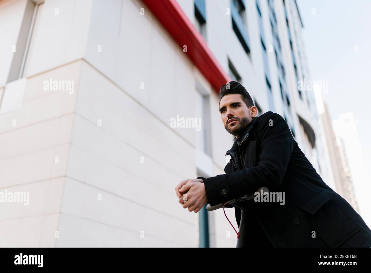 Man outdoors leaning on electric hi-res stock photography and images ...
