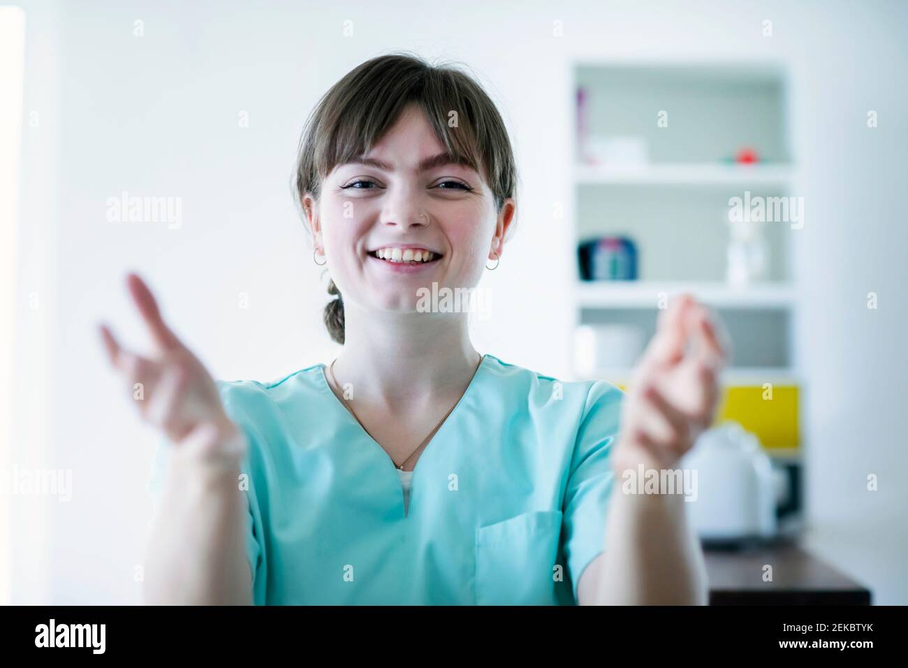 Smiling nurse in white hi-res stock photography and images - Alamy