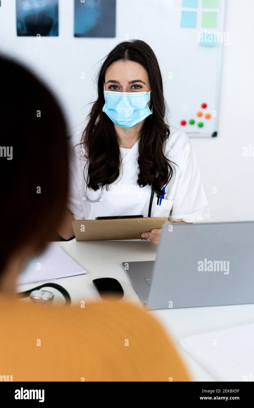 Work during pandemic young women hi-res stock photography and images ...
