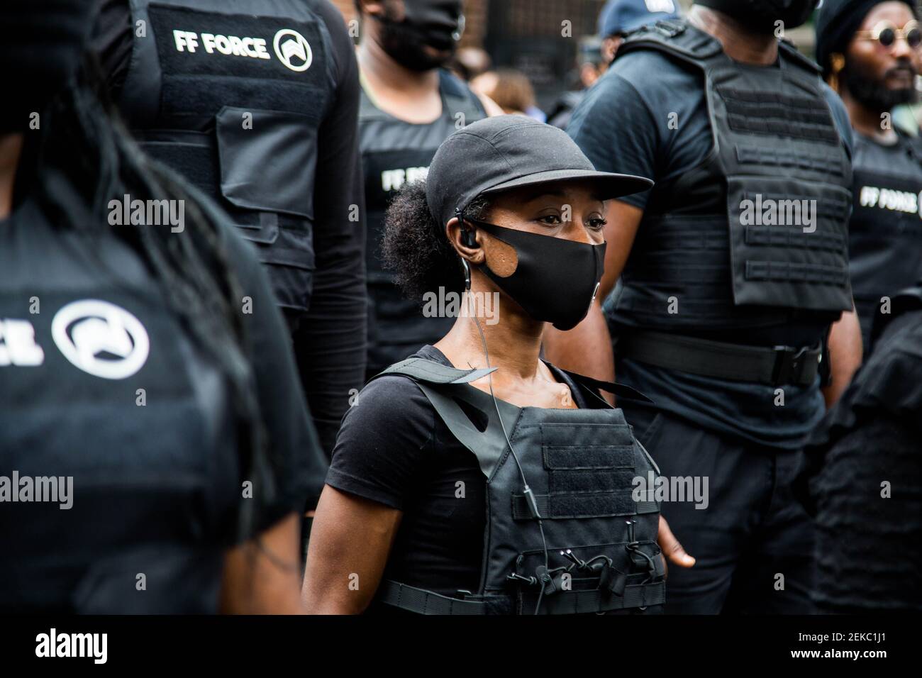 Members of FF Force AKA Forever Family stand outside Brixton town hall ...
