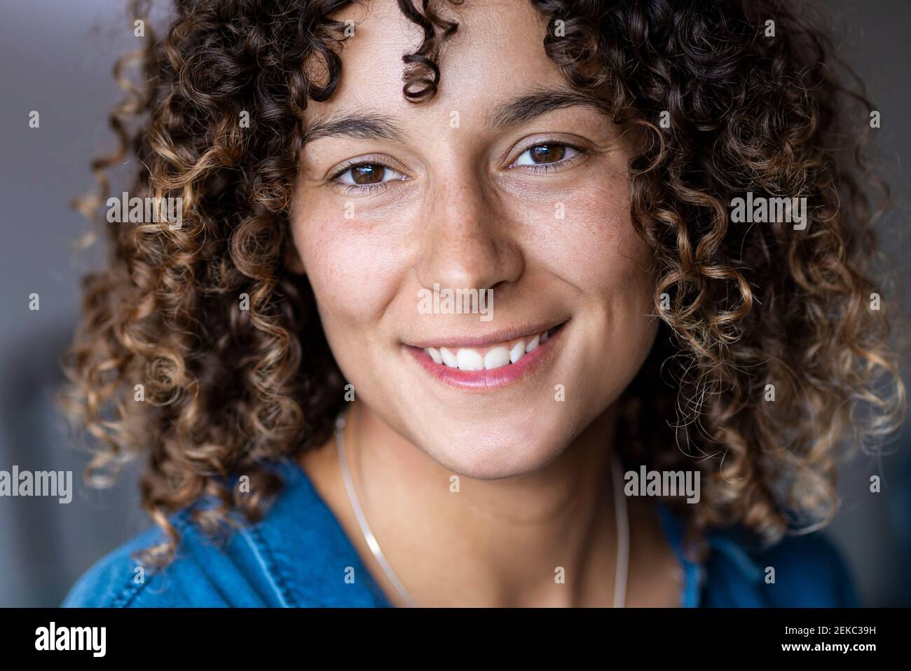 Beautiful smiling woman at home Stock Photo - Alamy