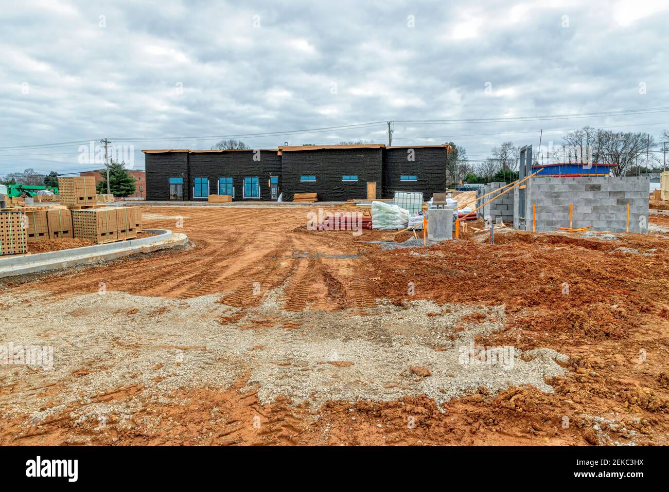 Horizontal shot of a new restaurant construction site on a cloudy day ...