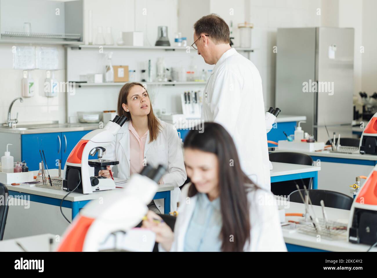 Teacher student classroom face to face hi-res stock photography and ...