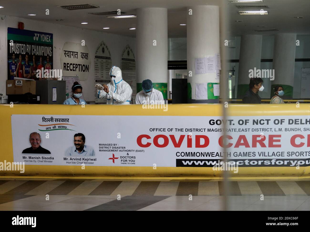 Healthcare workers are see wearing protective masks at the Covid-19 ...