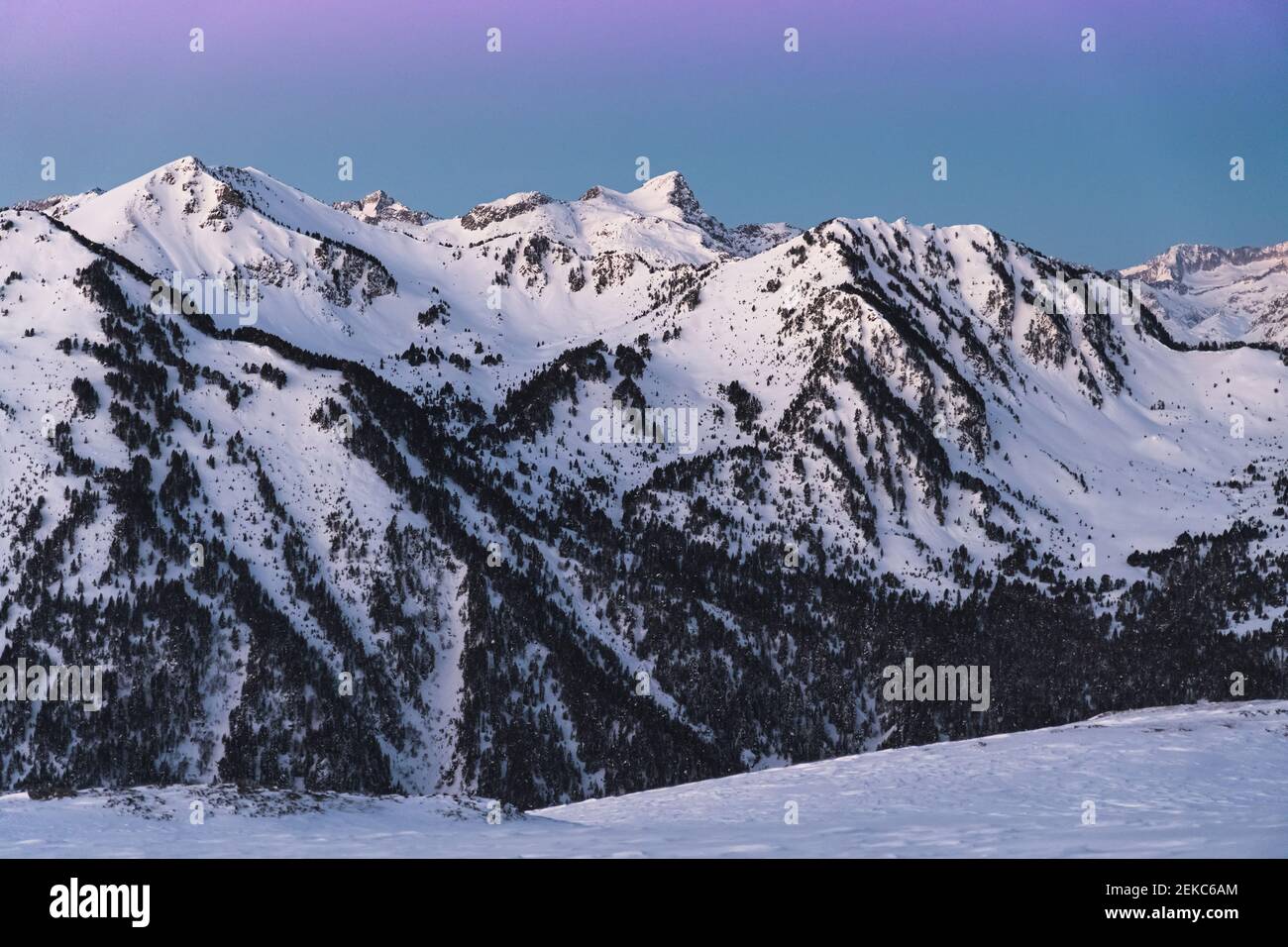 Pyrenees mountain covered in snow during sunrise Stock Photo - Alamy