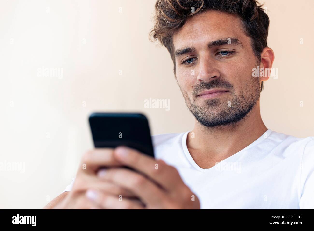 Serious adult man using hi-res stock photography and images - Alamy