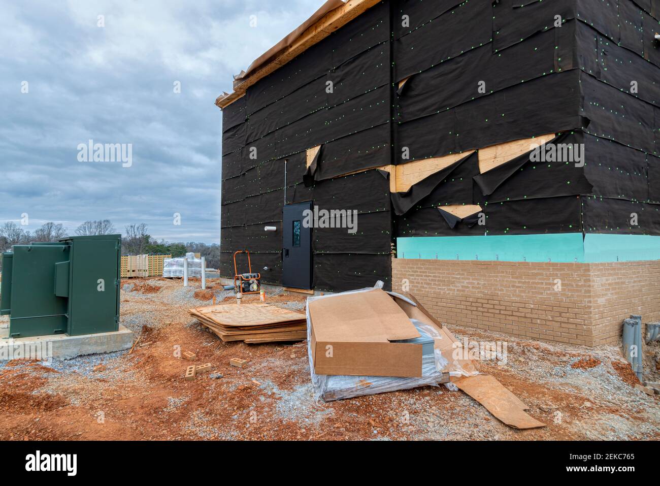 Horizontal shot of the beginning external brick work on a new ...