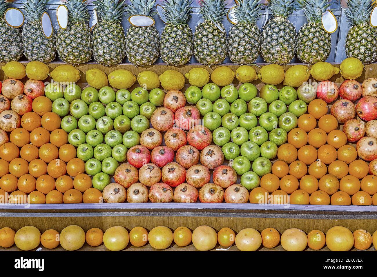 Layout of fruits in triangular pattern on counter of street store Stock ...