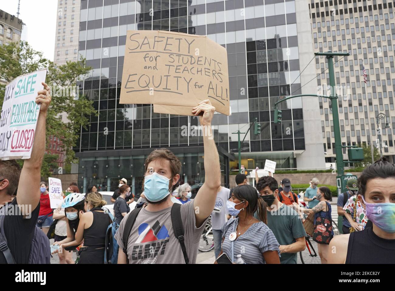 A protester holds a placard during the demonstration. Black Lives ...