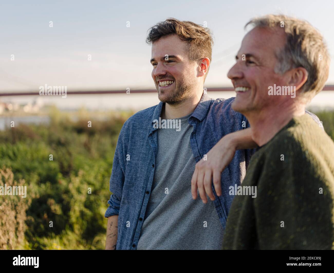 Father talking to child laughing hi-res stock photography and images ...