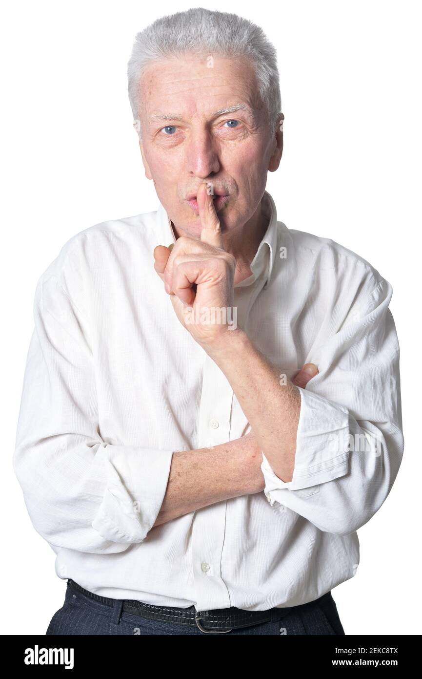 Old man finger on lips hi-res stock photography and images - Alamy