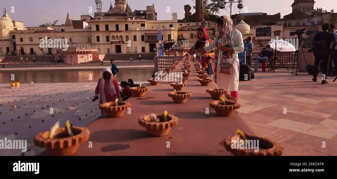 AYODHYA, INDIA - AUGUST 4: Earthen lamps laid out as part of ...