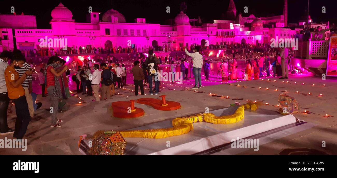 AYODHYA, INDIA - AUGUST 4: Hindu devotees light lamps on 'Deepotsav' at ...