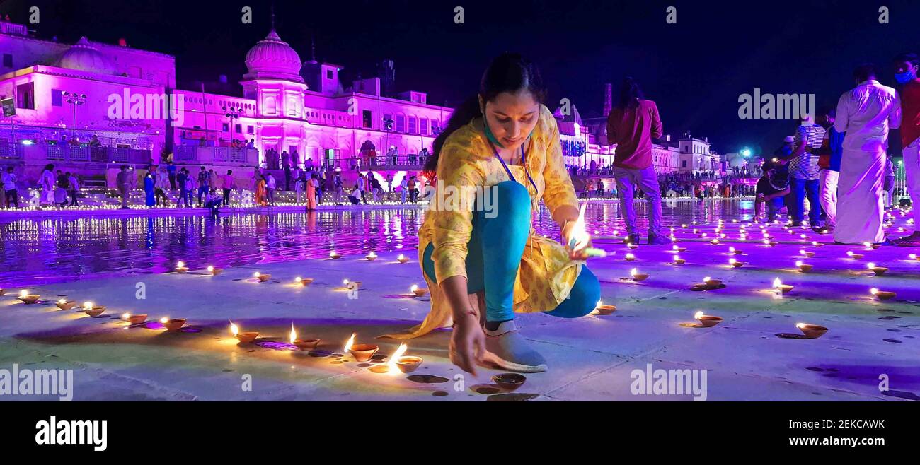 AYODHYA, INDIA - AUGUST 4: Hindu devotees light lamps on 'Deepotsav' at ...