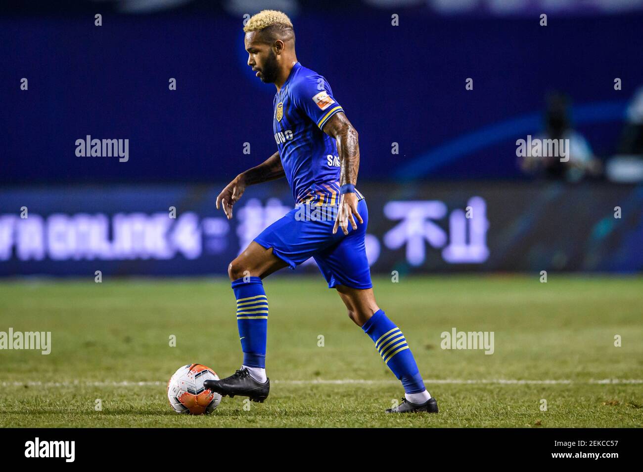 Brazilian football player Alex Teixeira of Jiangsu Suning F.C. keeps ...