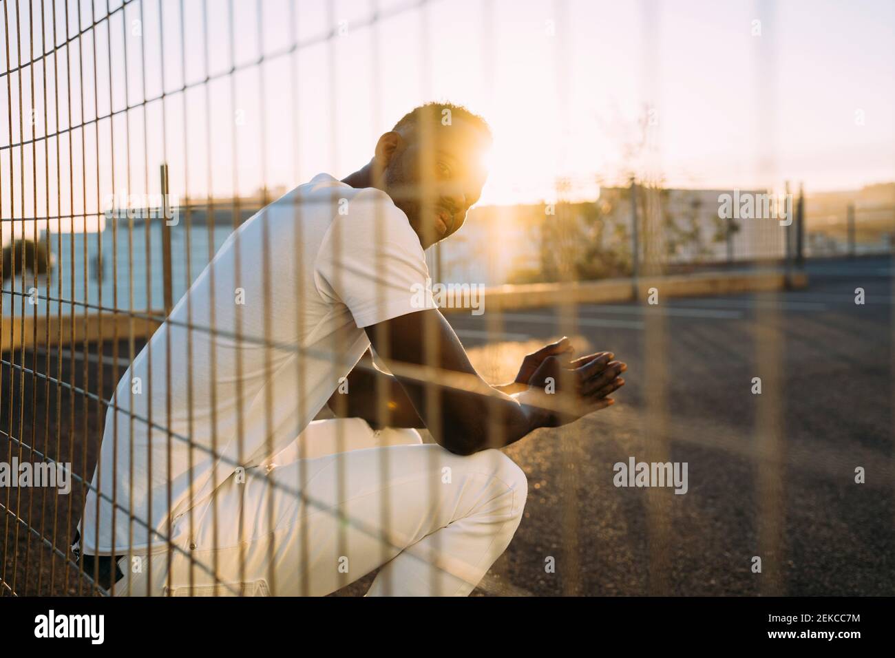 Looking through fence at camera hi-res stock photography and images - Alamy
