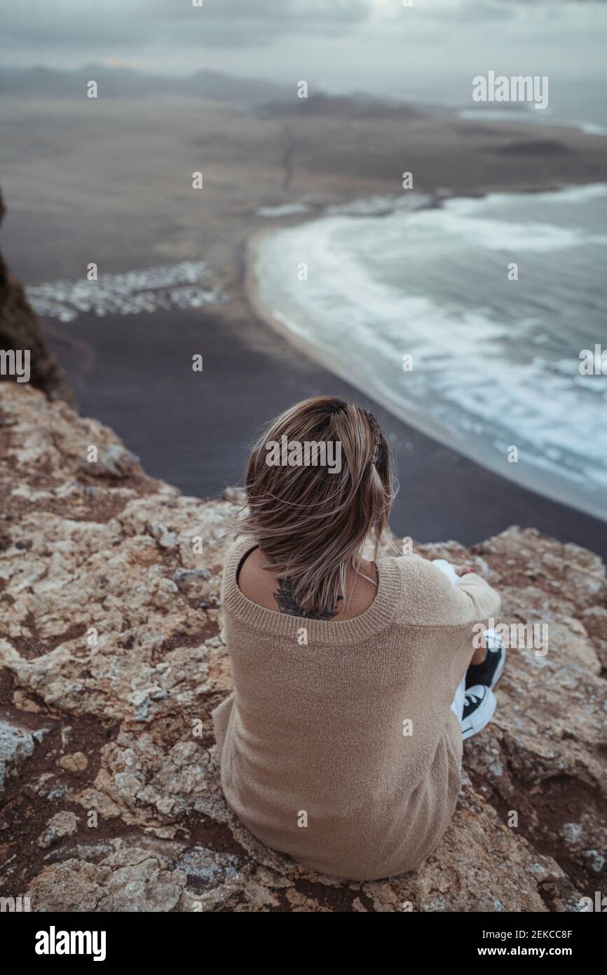 Serene female explorer sitting hi-res stock photography and images - Alamy