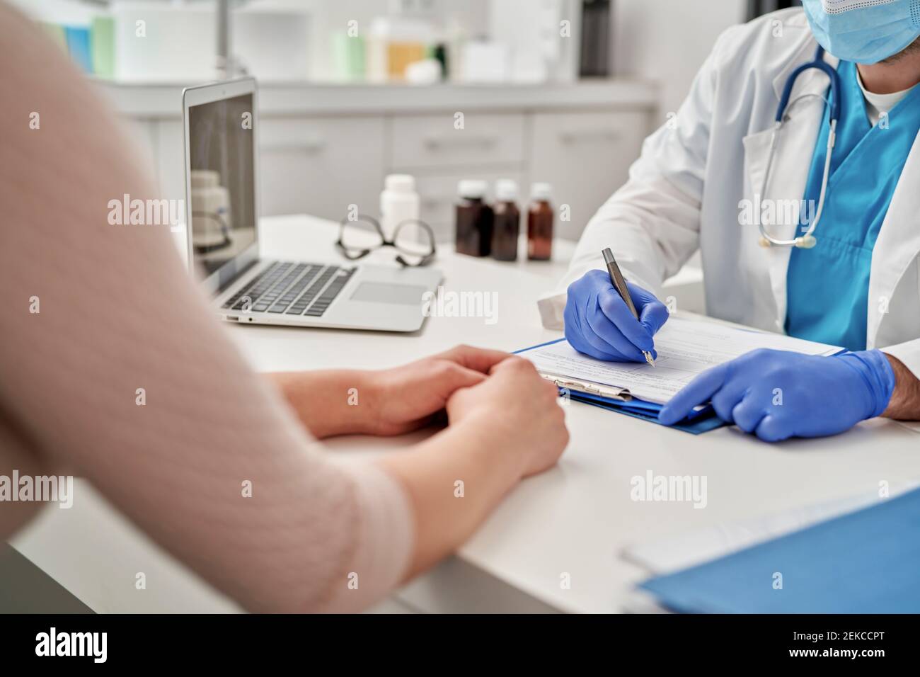 Hand writing medical care hi-res stock photography and images - Alamy