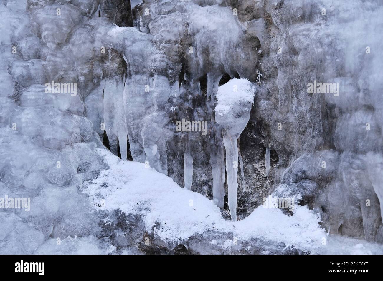 Frozen water on rock Stock Photo - Alamy