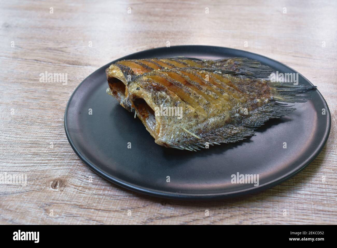 deep fried snake skin catfish or gourami on dish Stock Photo - Alamy