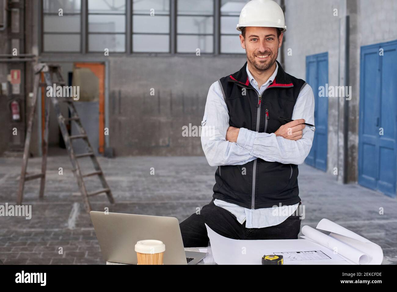 Architect standing in front building hi-res stock photography and ...