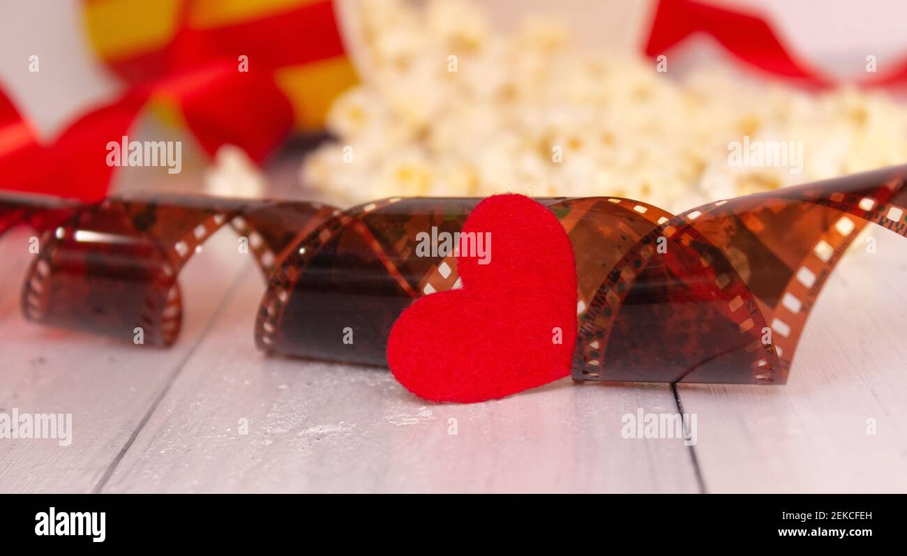Red heart and film. The concept of cinema, love Stock Photo - Alamy