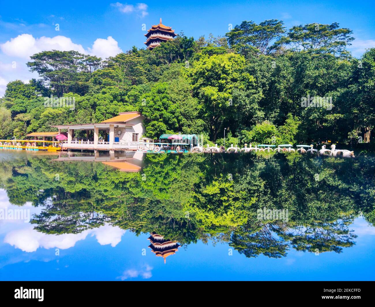 --FILE--Buildings at a local park and their reflections, Chang'an town ...