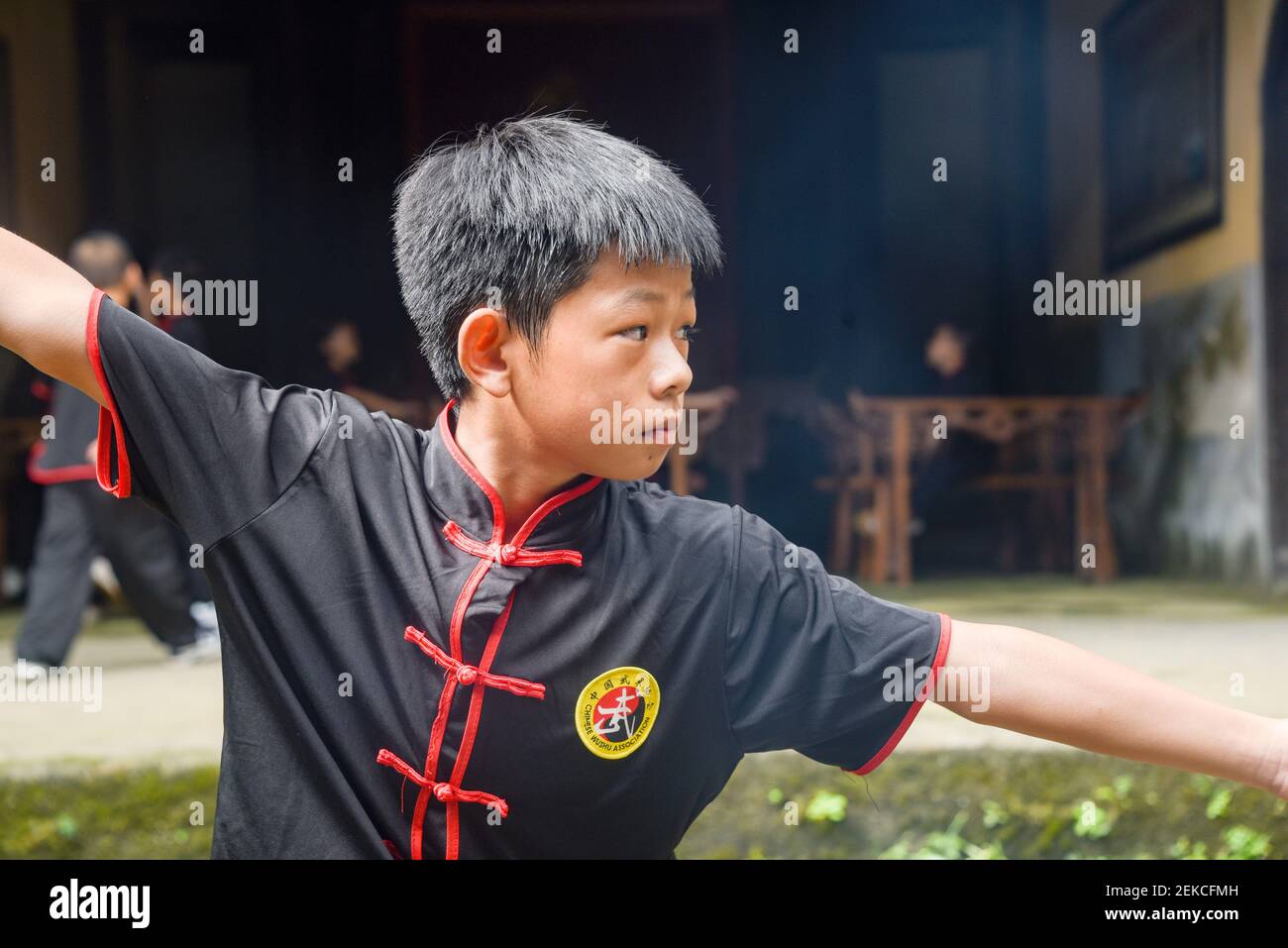 Jiangxiï¼ŒCHINA-Children practice boxing in yanxi Ancient Village in ...