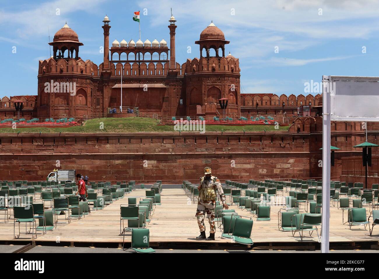 A security man walks past at the Red Fort as preparation underway on ...