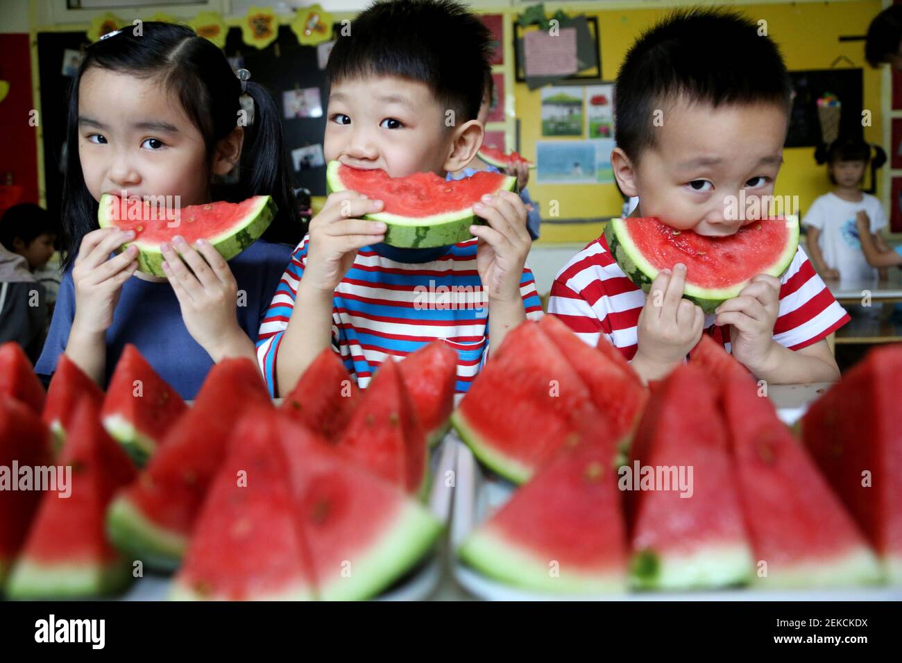 Children are eating watermelons to welcome the ¡°autumn begins¡± in ...