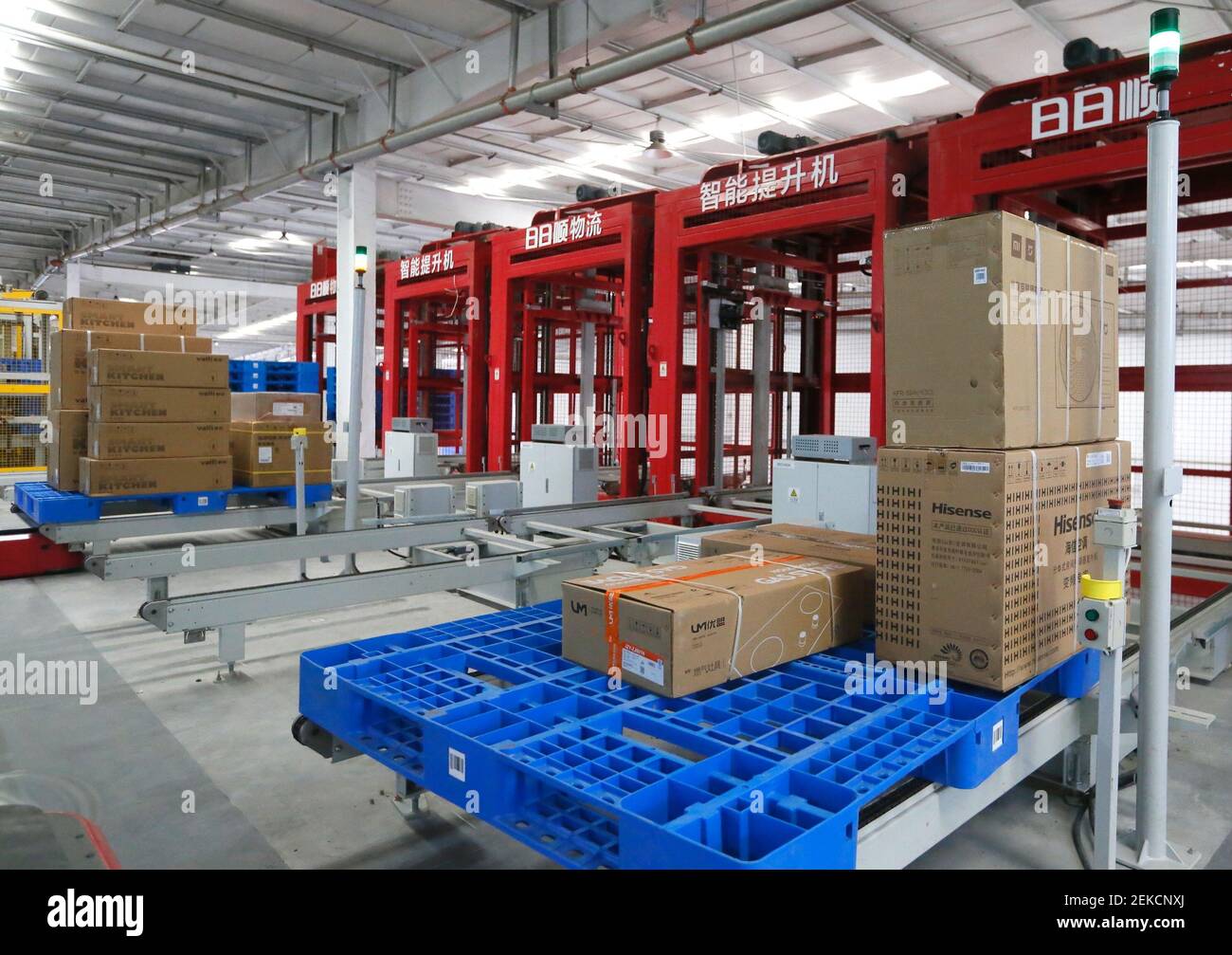 Large and bulky boxes are delivered at an unmanned smart warehouse ...