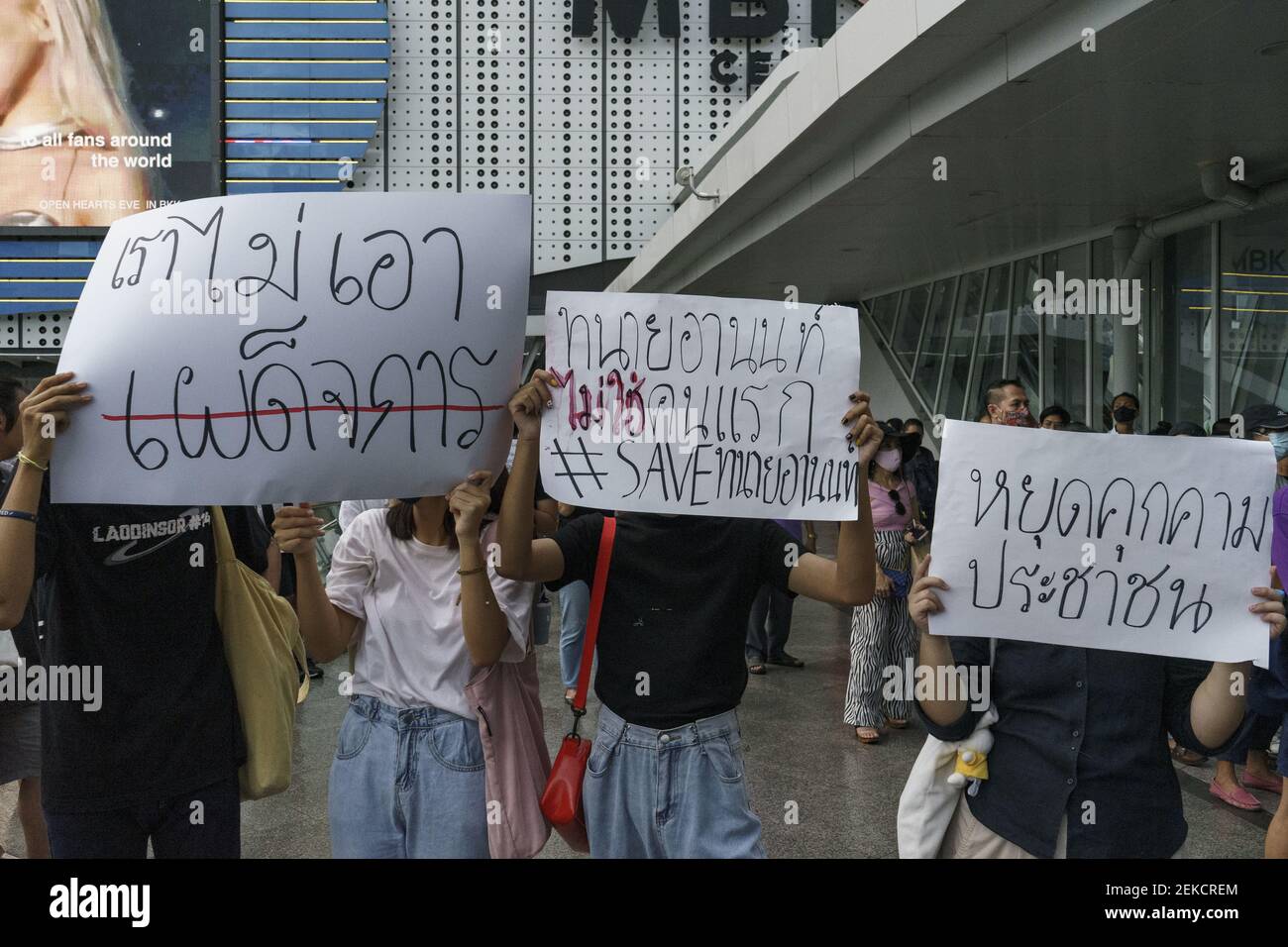 Protesters holding placards during the demonstration. People gathered ...