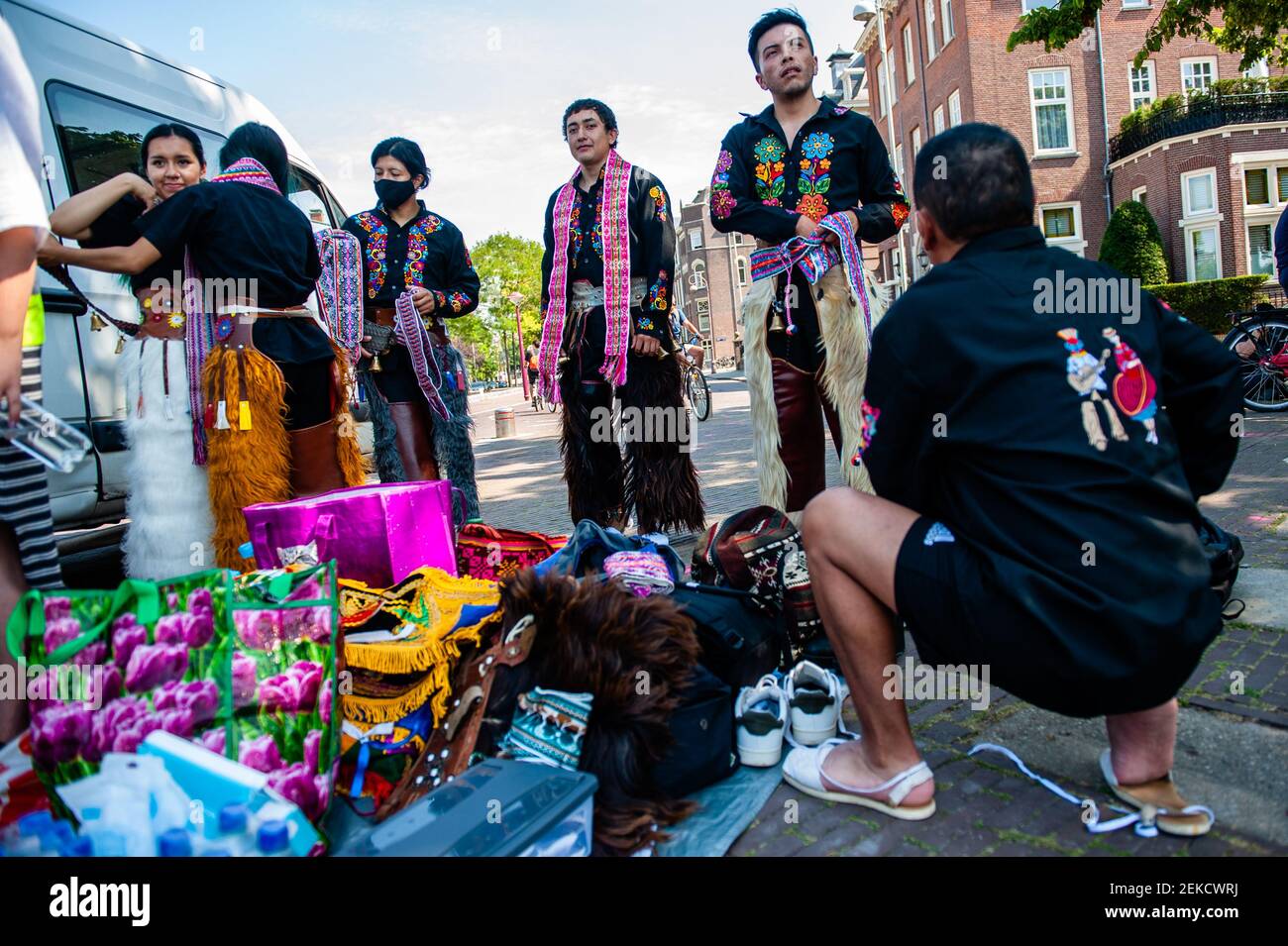 People wearing traditional costumes during the commemoration. People ...