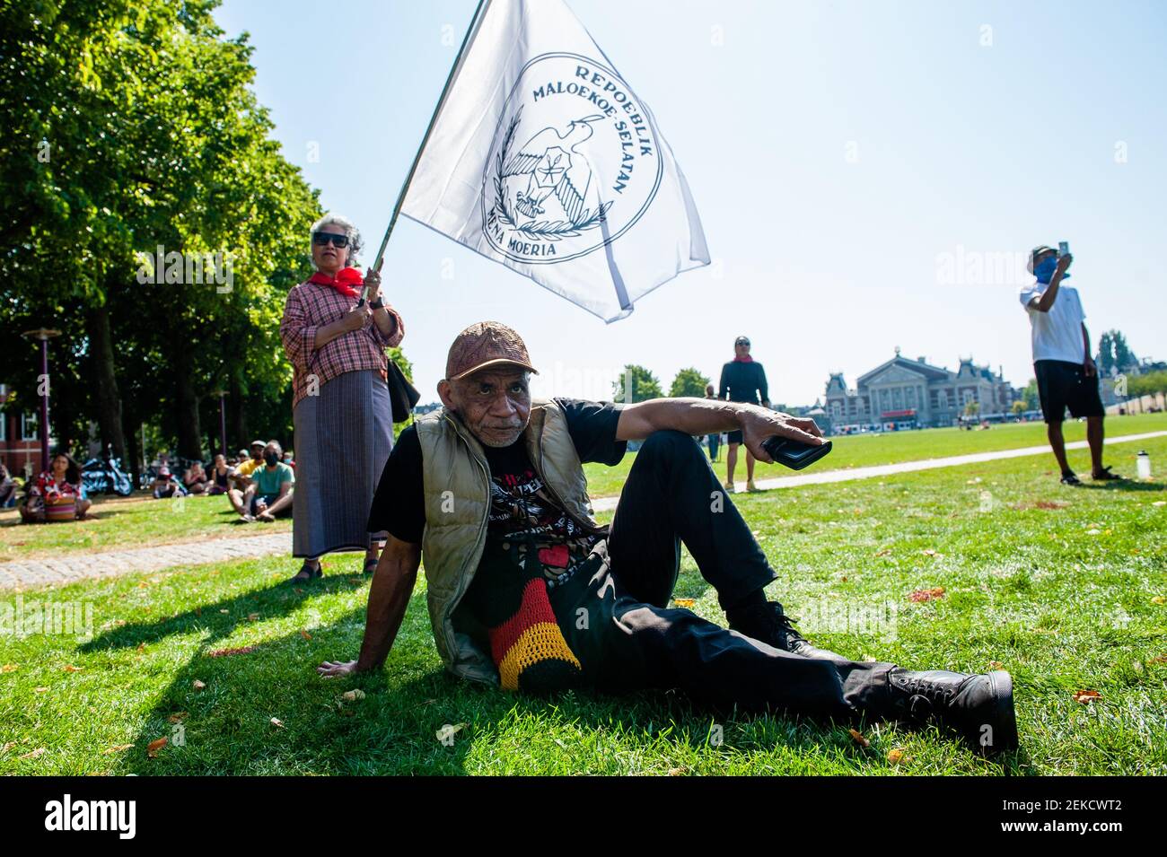 A woman holding a flag of an indigenous tribe during the commemoration ...