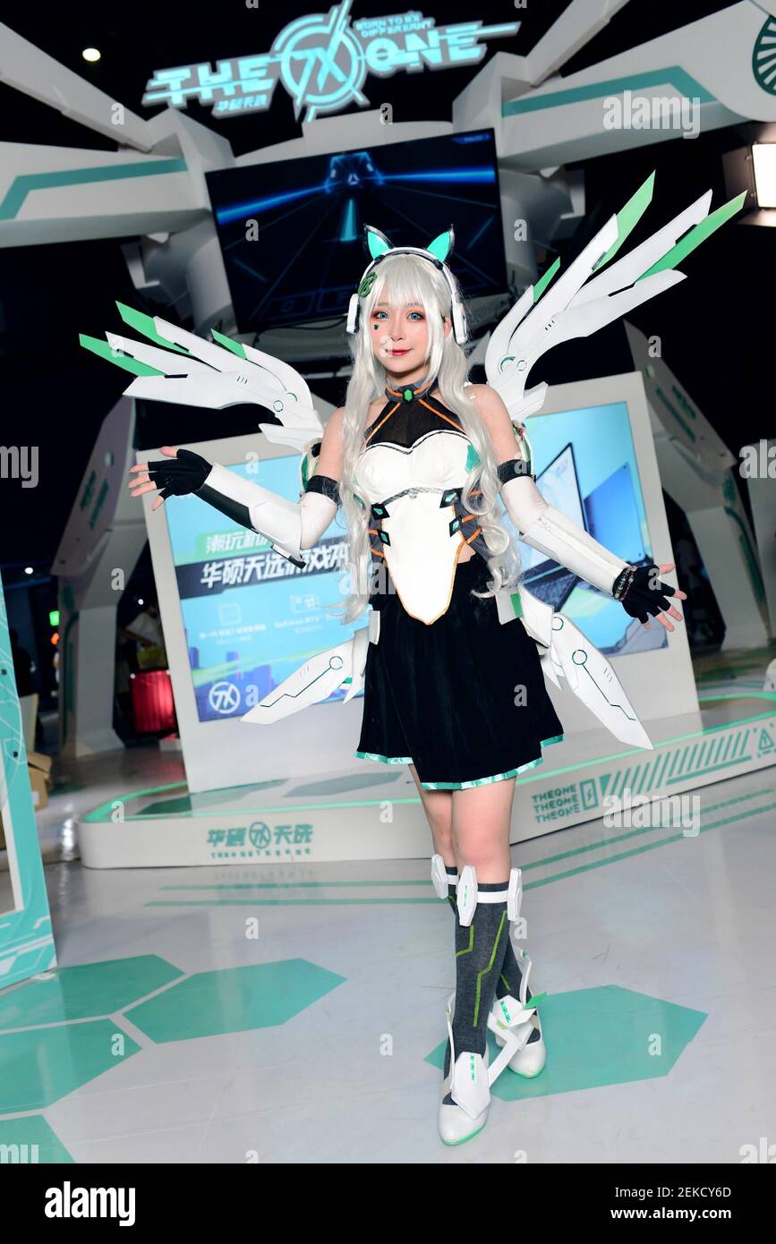 Cosplayers dress up as figures from animations, comics, and games ...