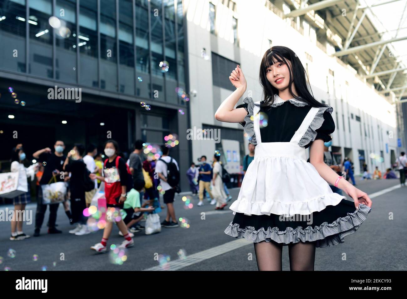 Cosplayers dress up as figures from animations, comics, and games ...