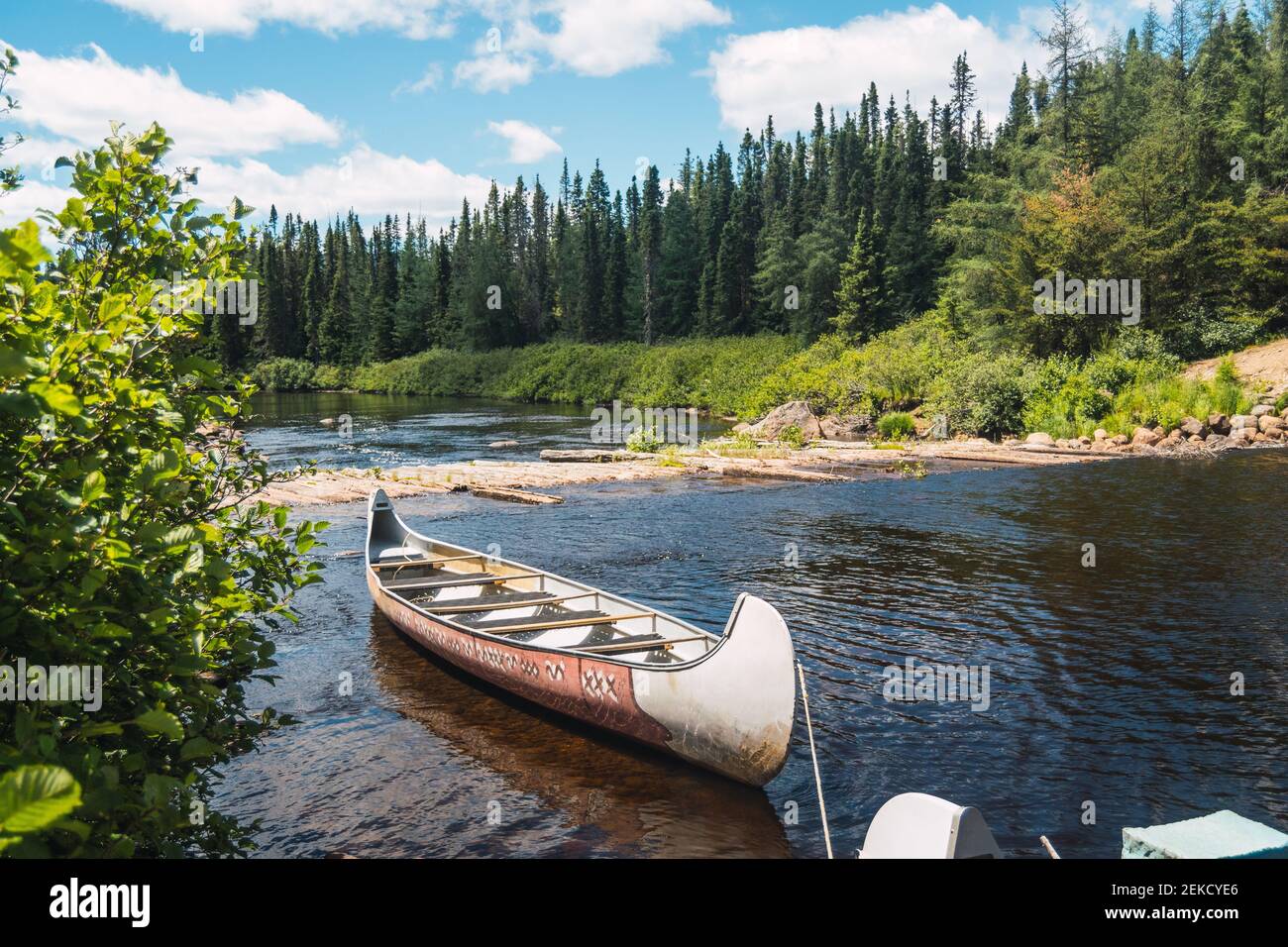 Canoe floating on a Canadian Lake Stock Photo - Alamy