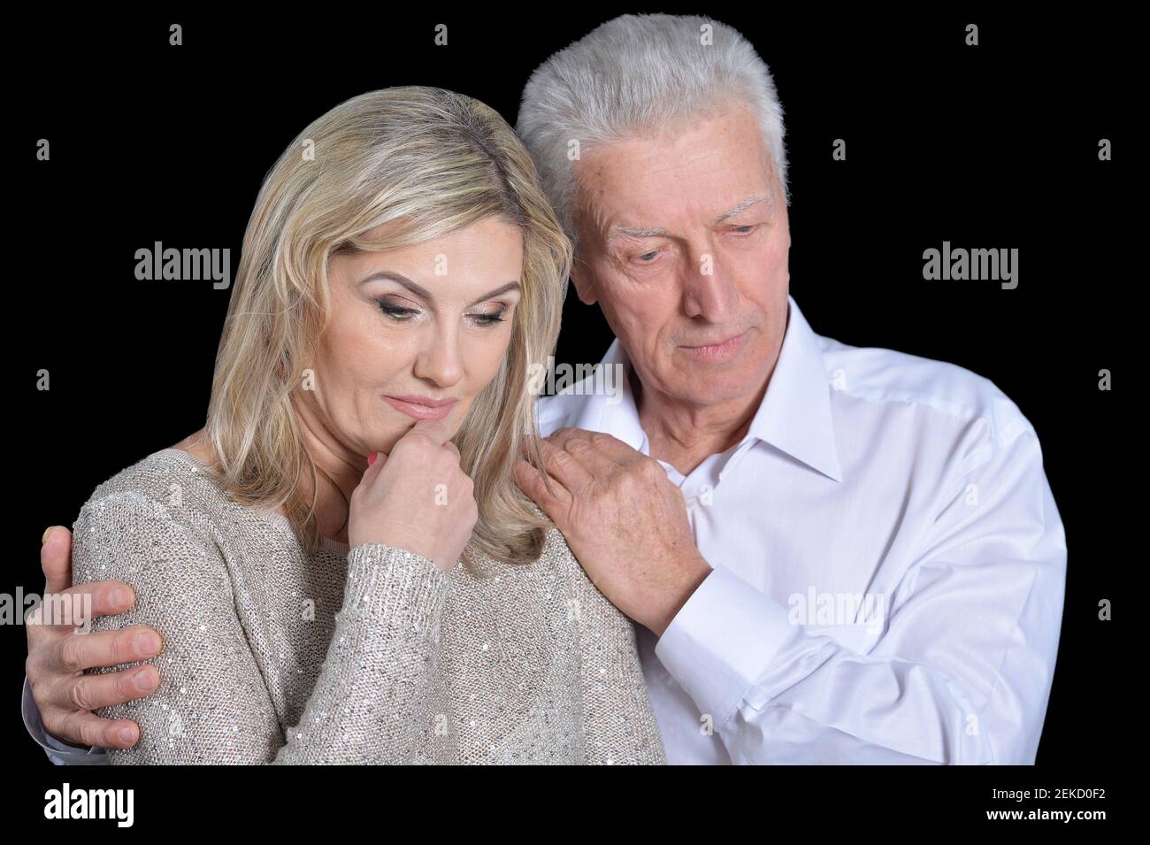 Portrait of a sad senior couple posing Stock Photo - Alamy