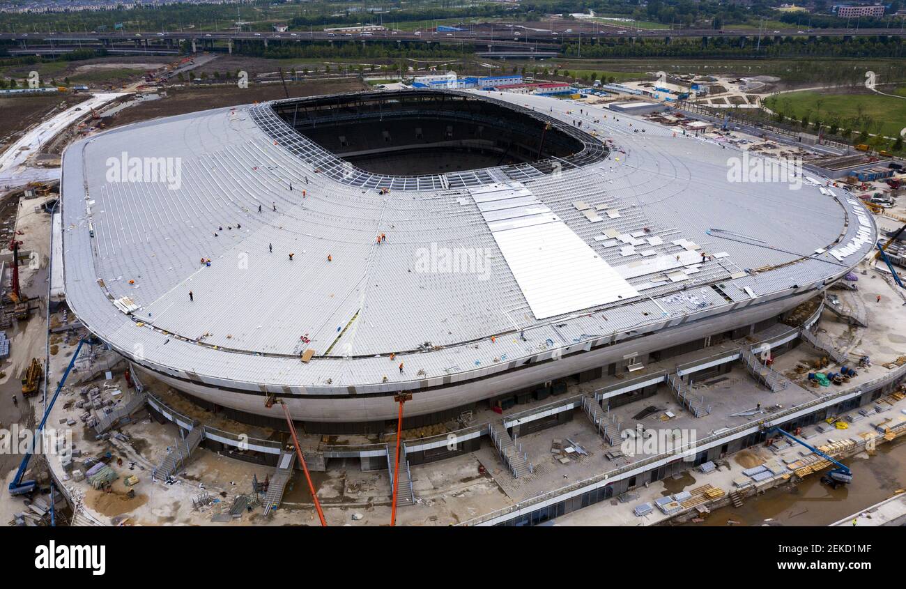 An aerial view of the Pudong Football Stadium under construction ...