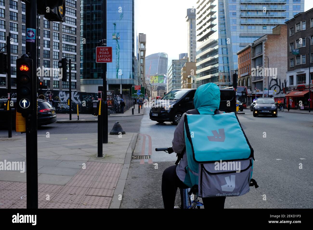 LONDON - 23RD FEBRUARY 2021: A Deliveroo food courier waiting at ...